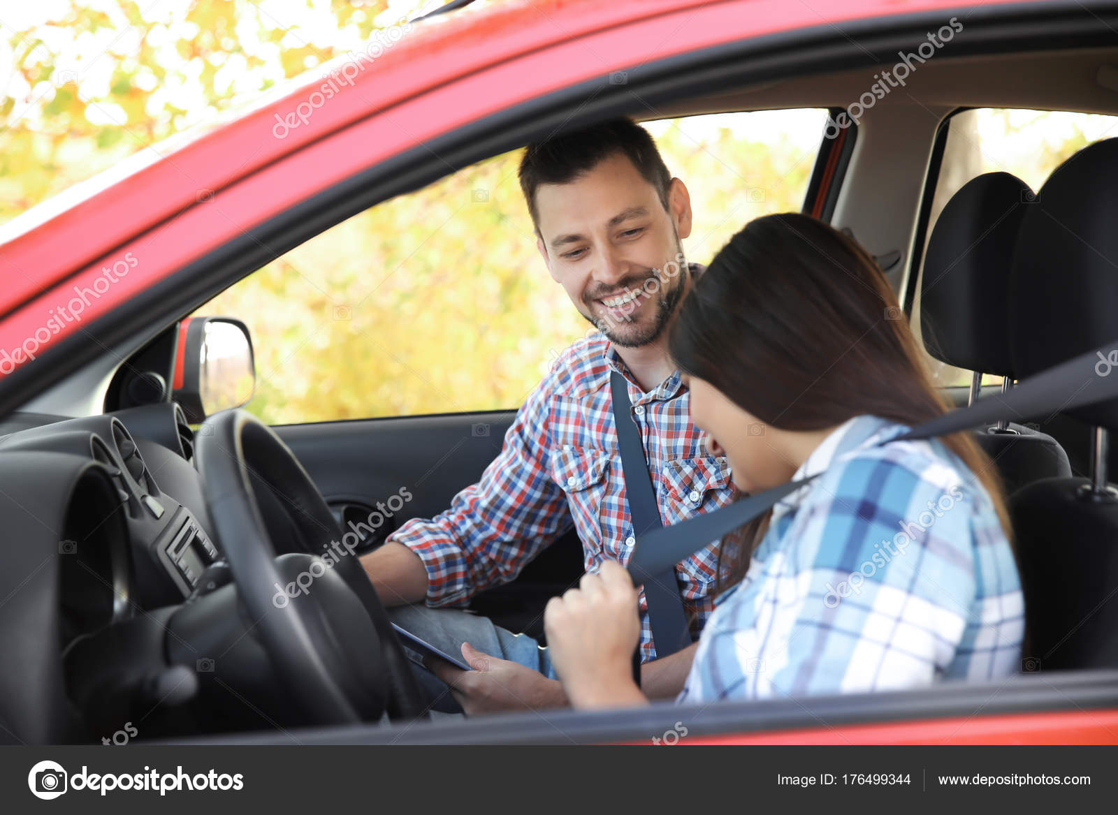 Young woman passing driving license exam — Stock Photo © belchonock ...
