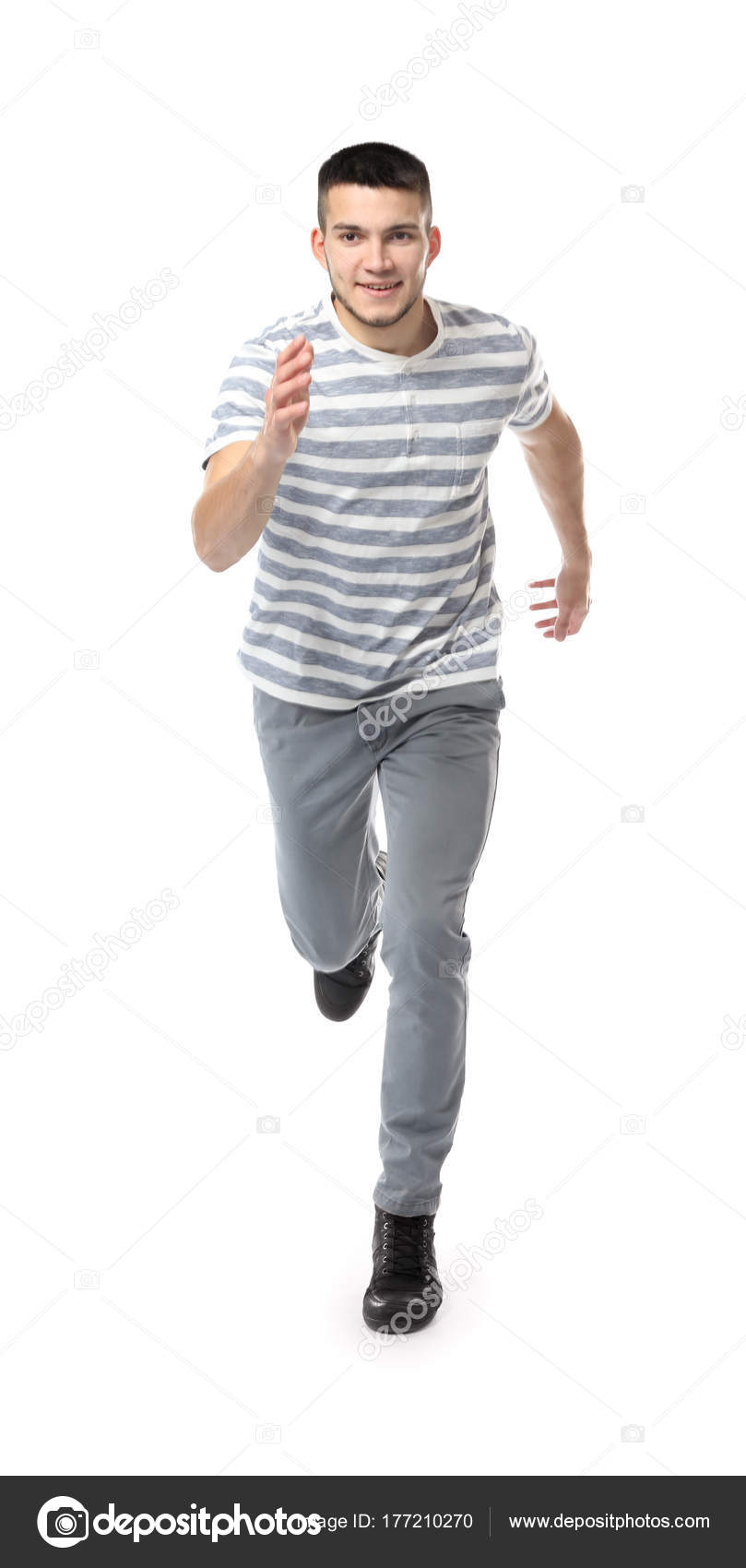 Man in casual clothes running — Stock Photo © belchonock #177210270