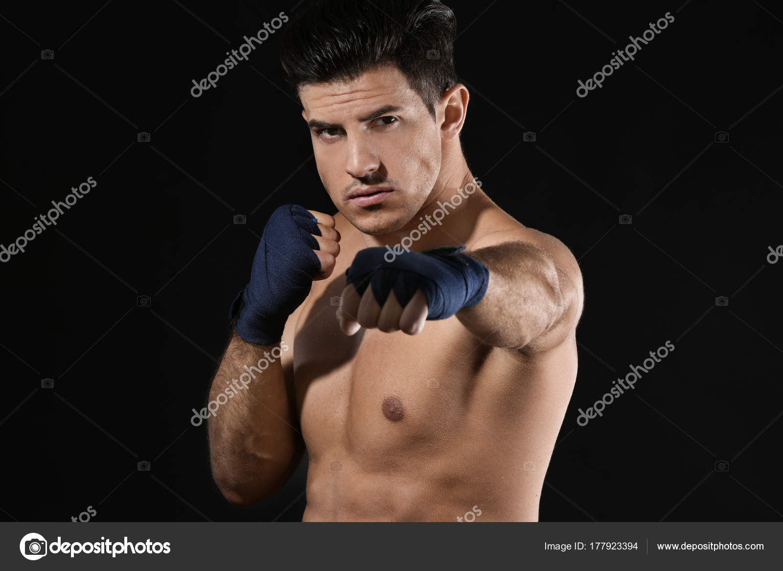 Attractive young boxer Stock Photo by ©belchonock 177923394