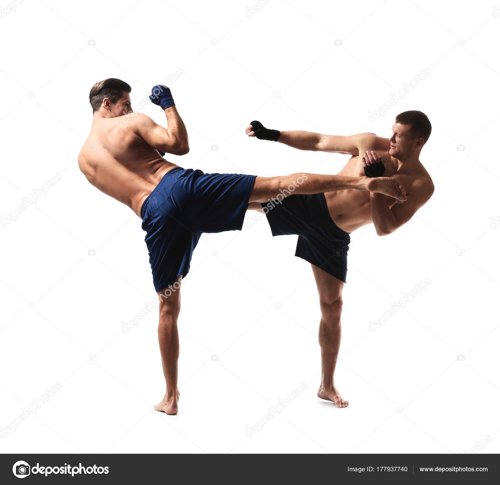 Attractive young kickboxers fighting Stock Photo by ©belchonock 177937740