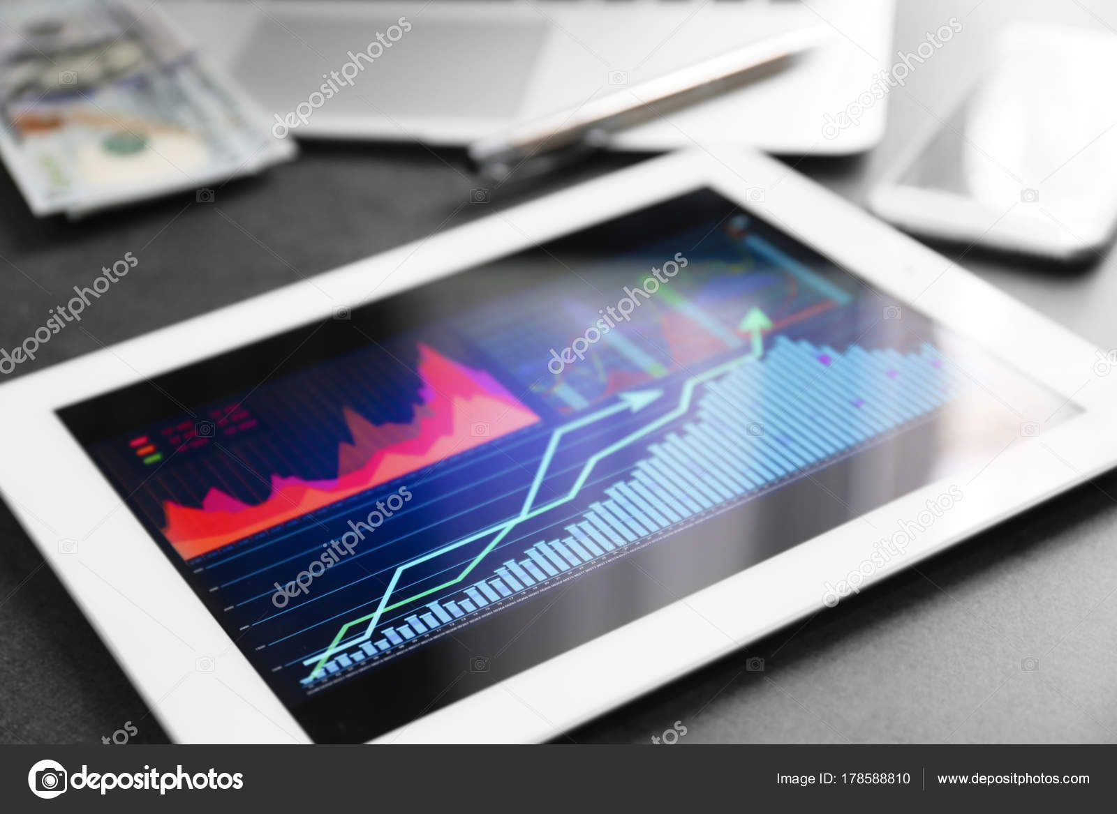 Tablet with stock data — Stock Photo © belchonock #178588810