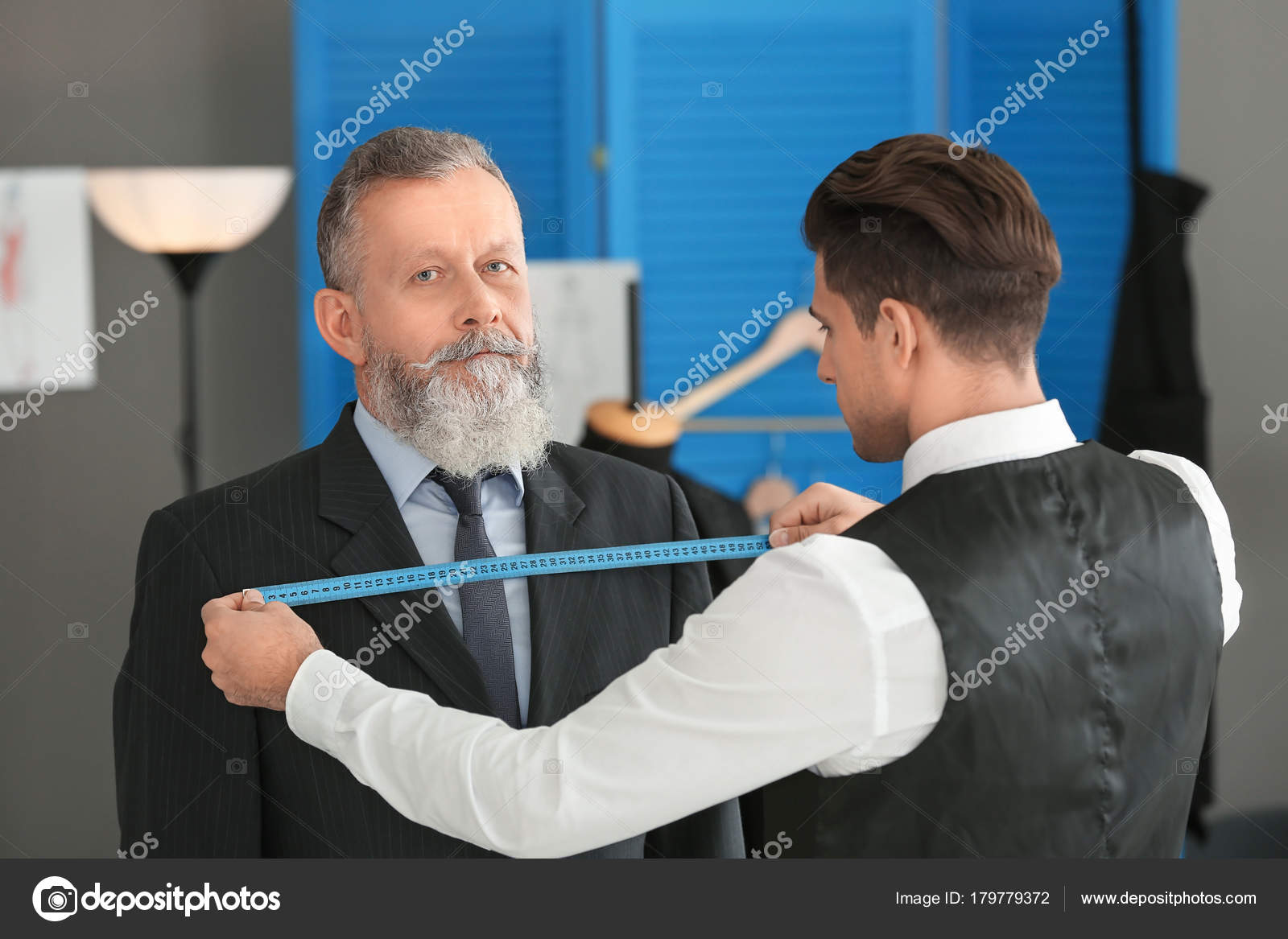 Tailor Taking Client Measurements Atelier — Stock Photo © belchonock ...