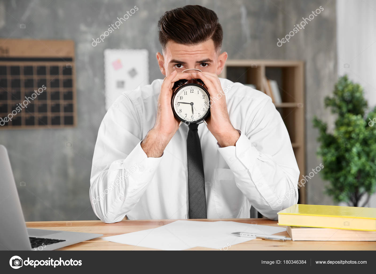 Handsome Manager Alarm Clock Office Stock Photo by ©belchonock 180346384