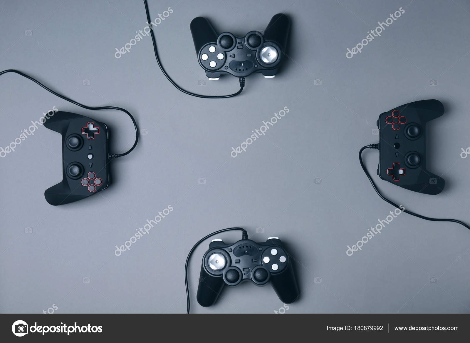 Video Game Controllers Grey Background Stock Photo by ©belchonock 180879992