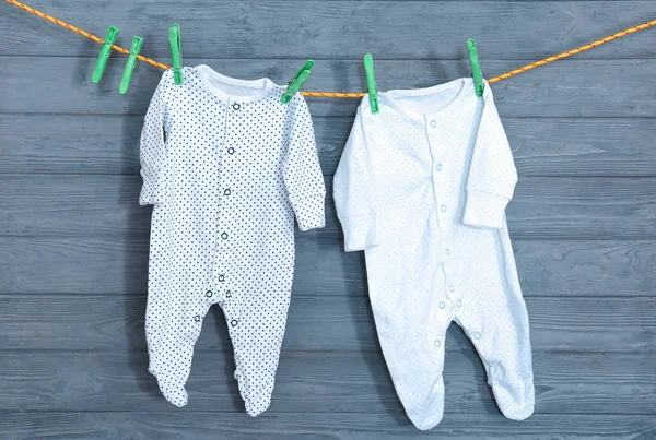 Children's Clothes Laundry Line Wooden Background Stock Photo by ...