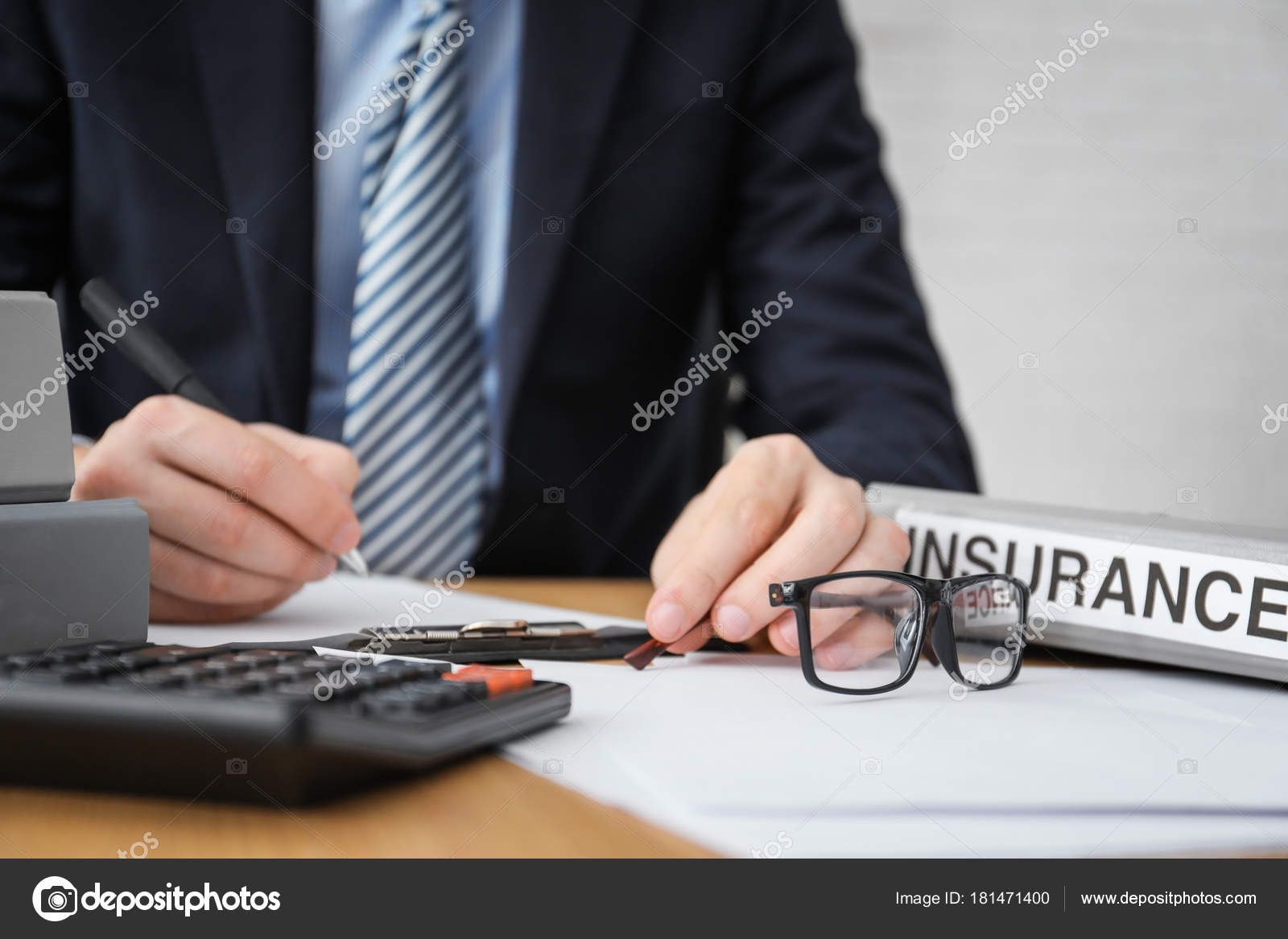 Male insurance agent at workplace — Stock Photo © belchonock #181471400