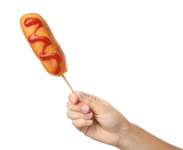 Woman holding tasty corn dog — Stock Photo © belchonock #184009370