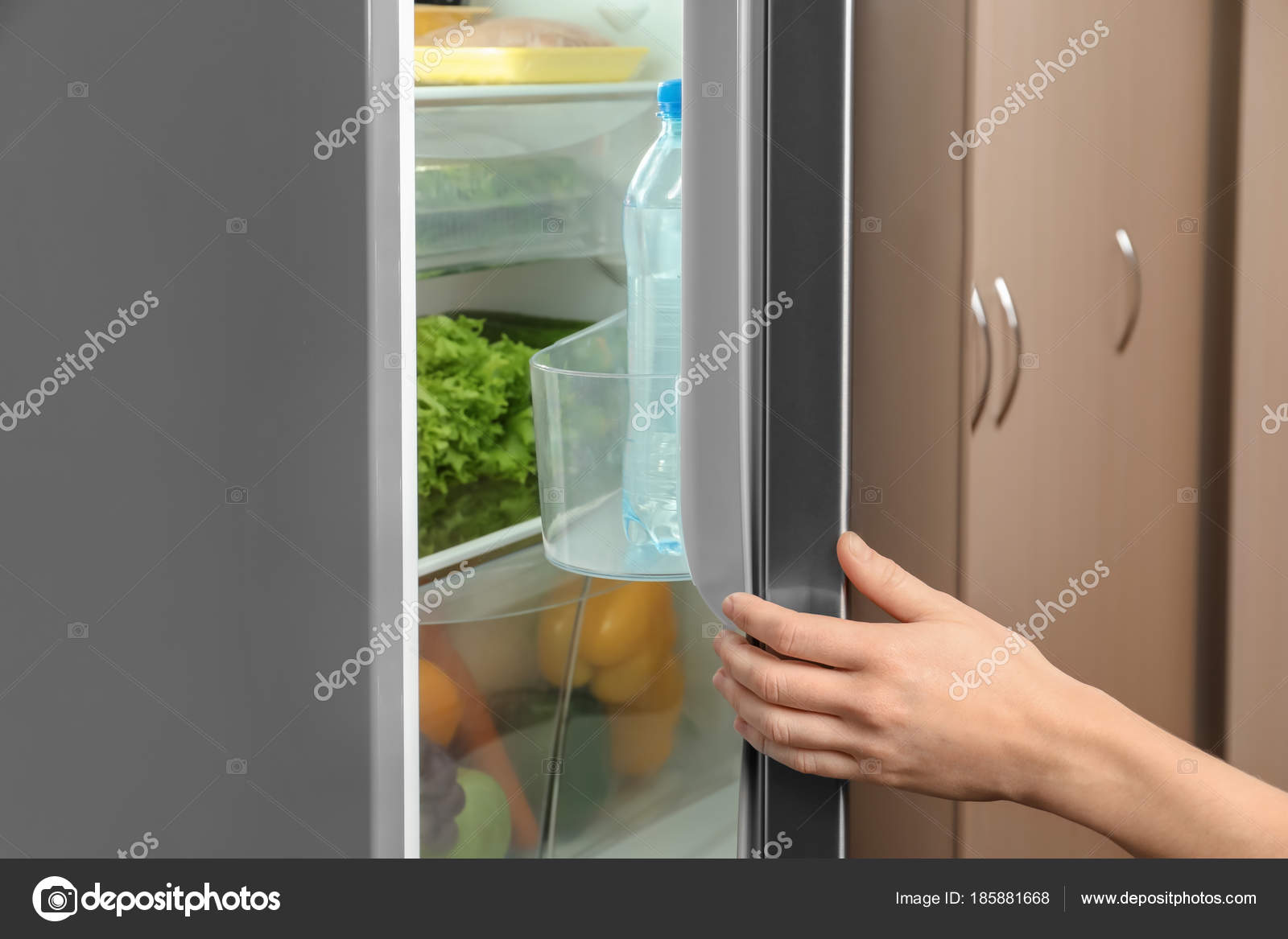 Young Woman Opening Refrigerator Closeup — Stock Photo © belchonock ...