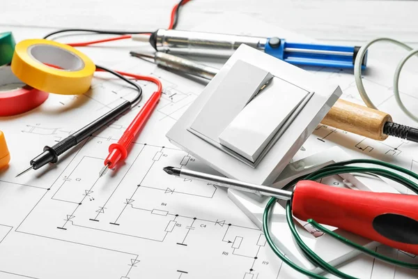 Different electrical tools Stock Photo by ©belchonock 146684019