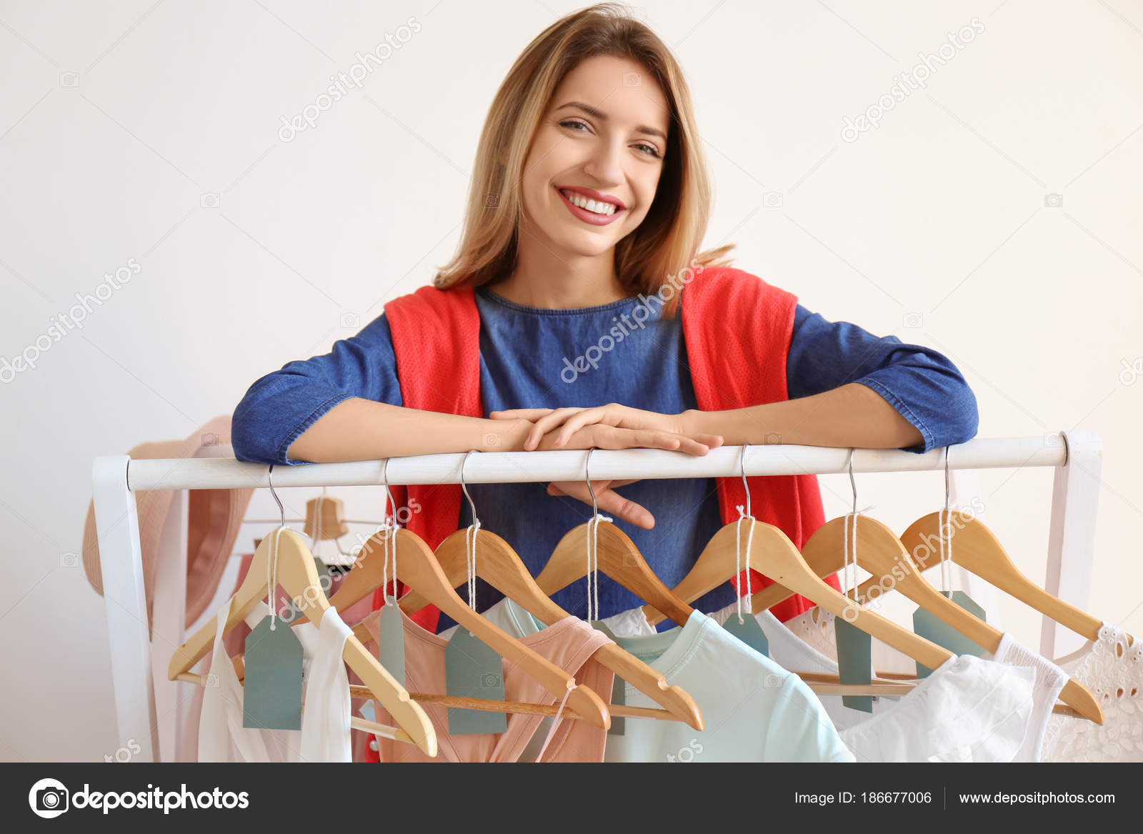 Young Woman Standing Clothes Rack Light Background Stylish Wardrobe ...