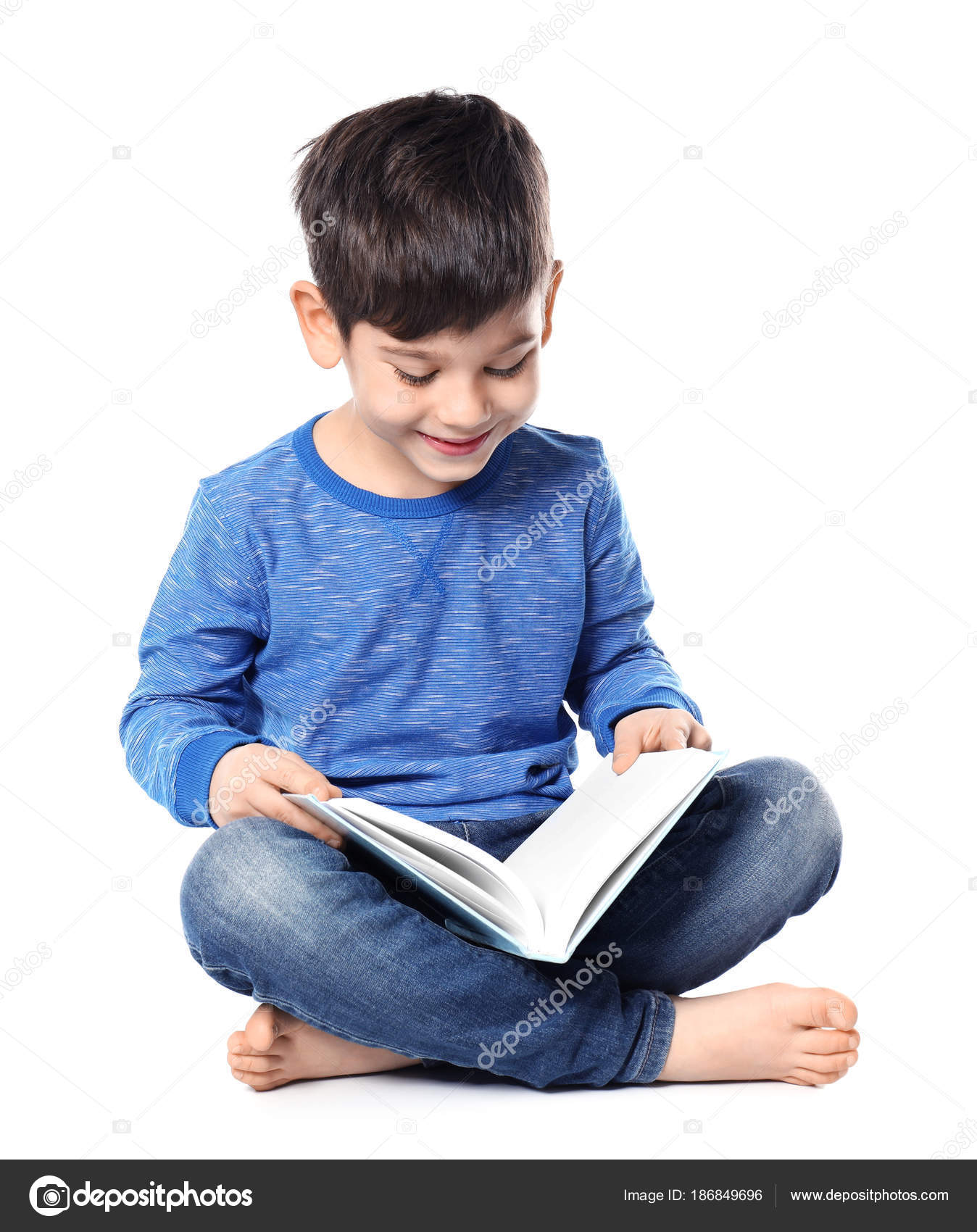 Cute little boy reading book Stock Photo by ©belchonock 186849696 Cute little boy reading book Stock Photo by ©belchonock 186849696