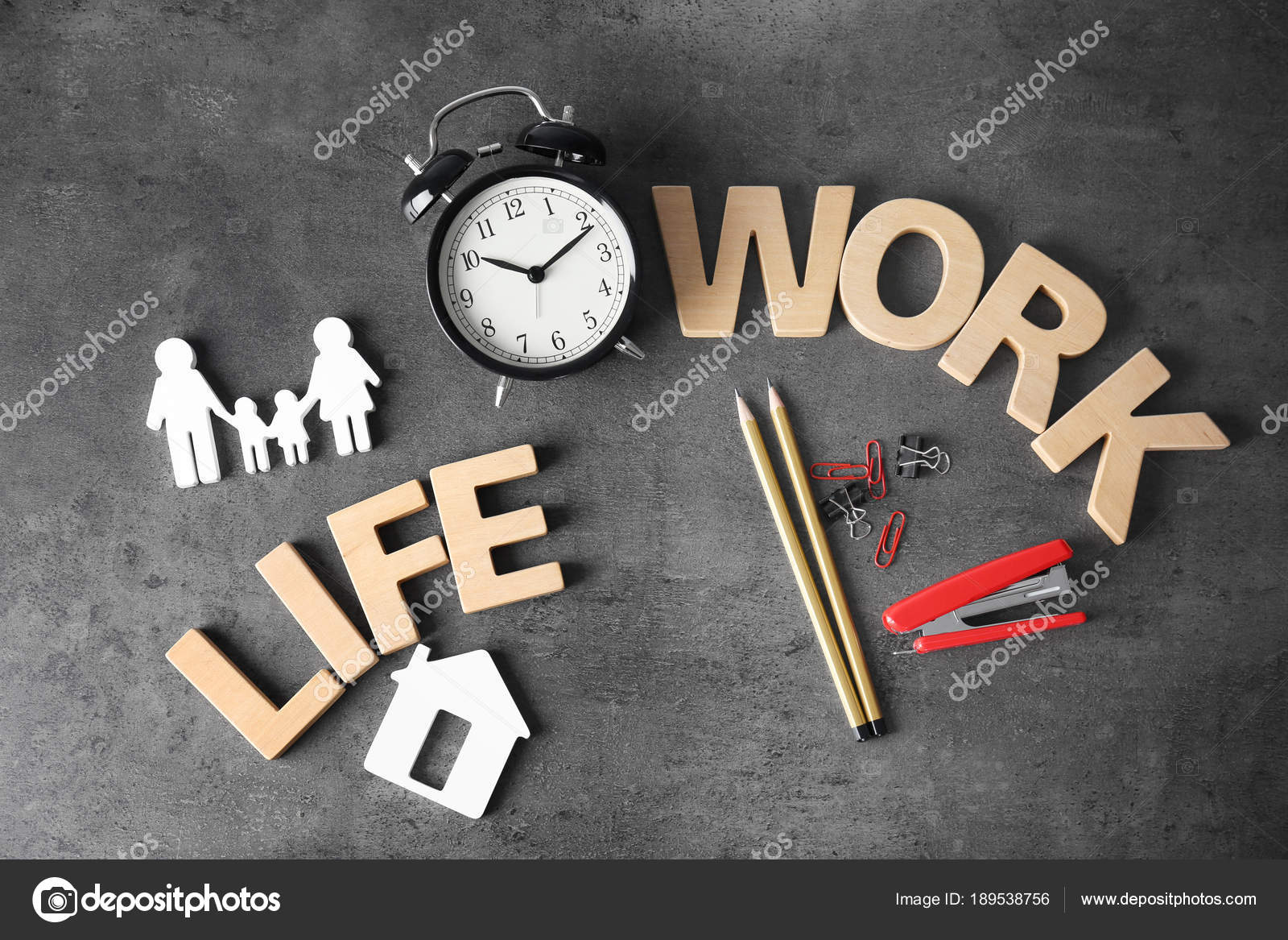 Composition with words WORK, LIFE and alarm clock on grey background ...