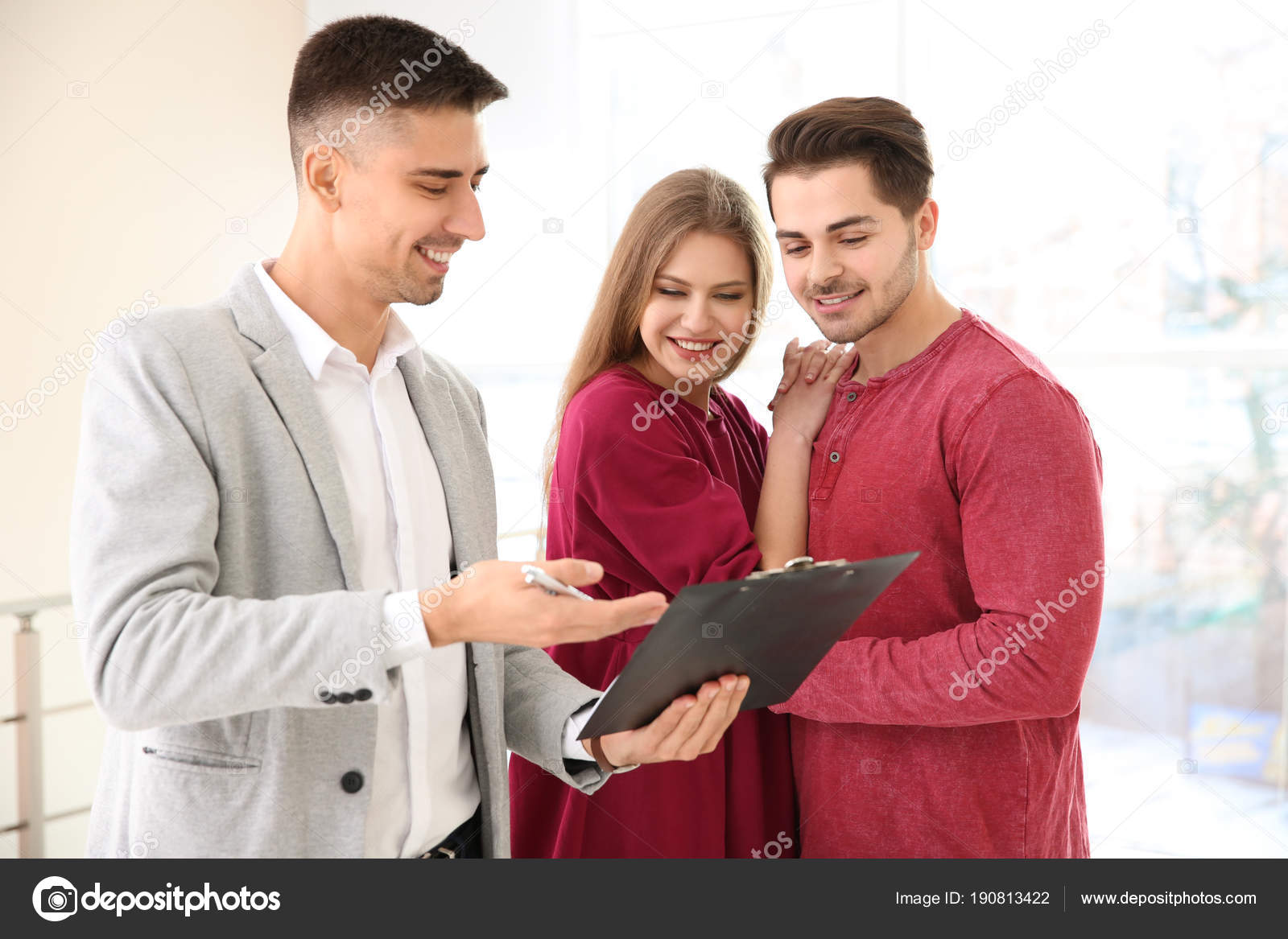 Real Estate Agent Clients New House Stock Photo by ©belchonock 190813422