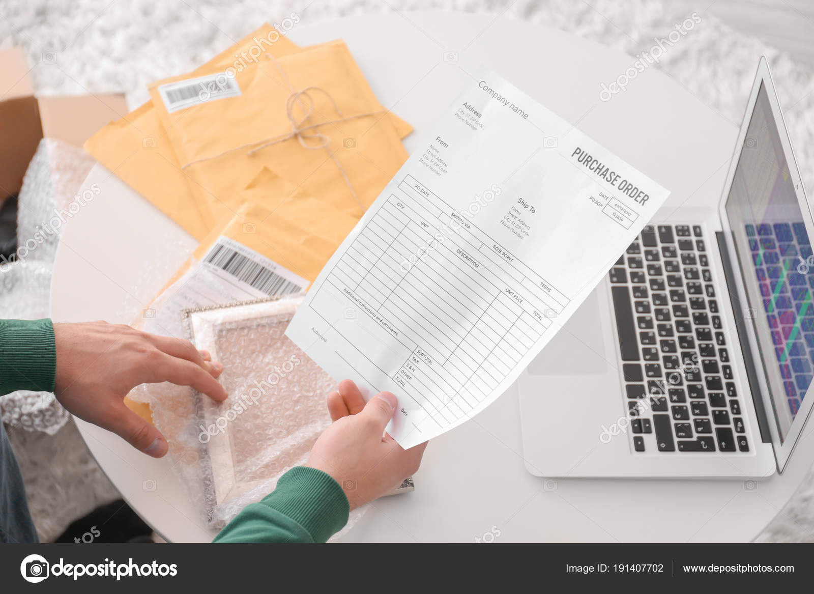 Young man with purchase order sheet — Stock Photo © belchonock #191407702