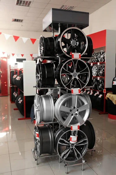 Modern Tire Store Interior Stock Photo by ©belchonock 192158016