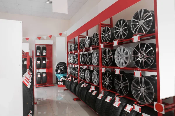 Modern Tire Store Interior Stock Photo by ©belchonock 192158016