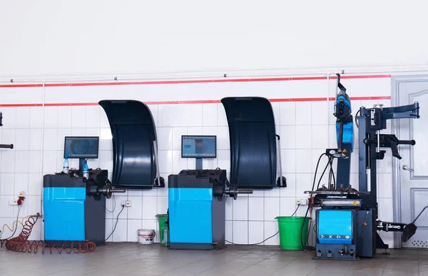 Car service center interior Stock Photo by ©belchonock 191408748