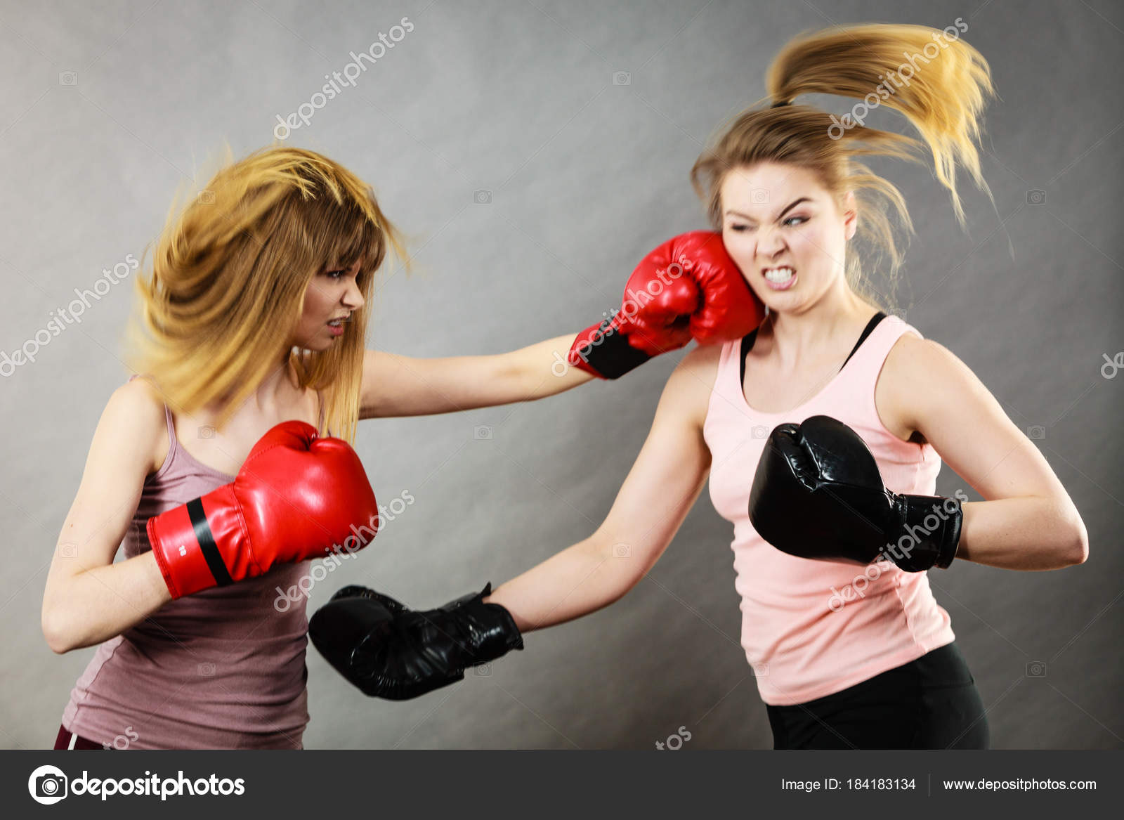 Two agressive women having boxing fight — Stock Photo © Anetlanda ...