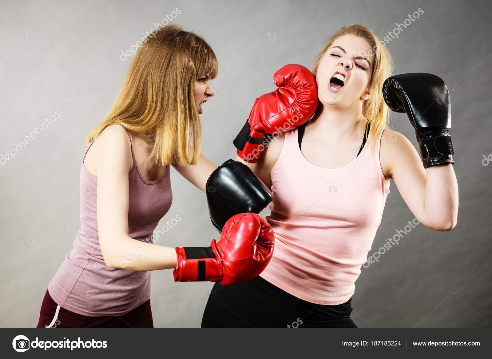 Two agressive women having boxing fight — Stock Photo © Anetlanda ...