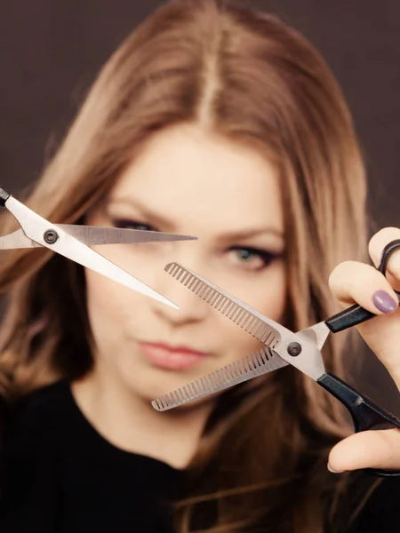 Professional elegant female barber with scissors. - Stock Image ...