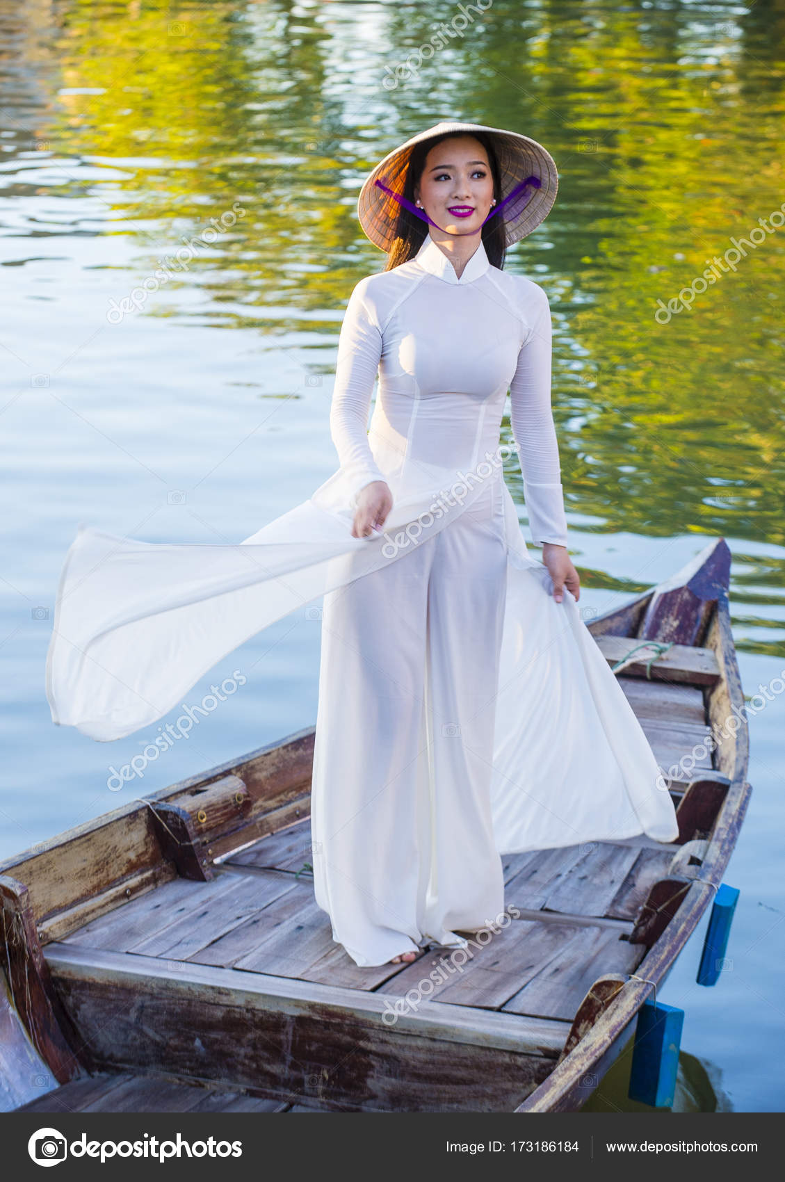 Vietnamese Woman With Ao Dai Dress Stock Editorial Photo © Kobbydagan