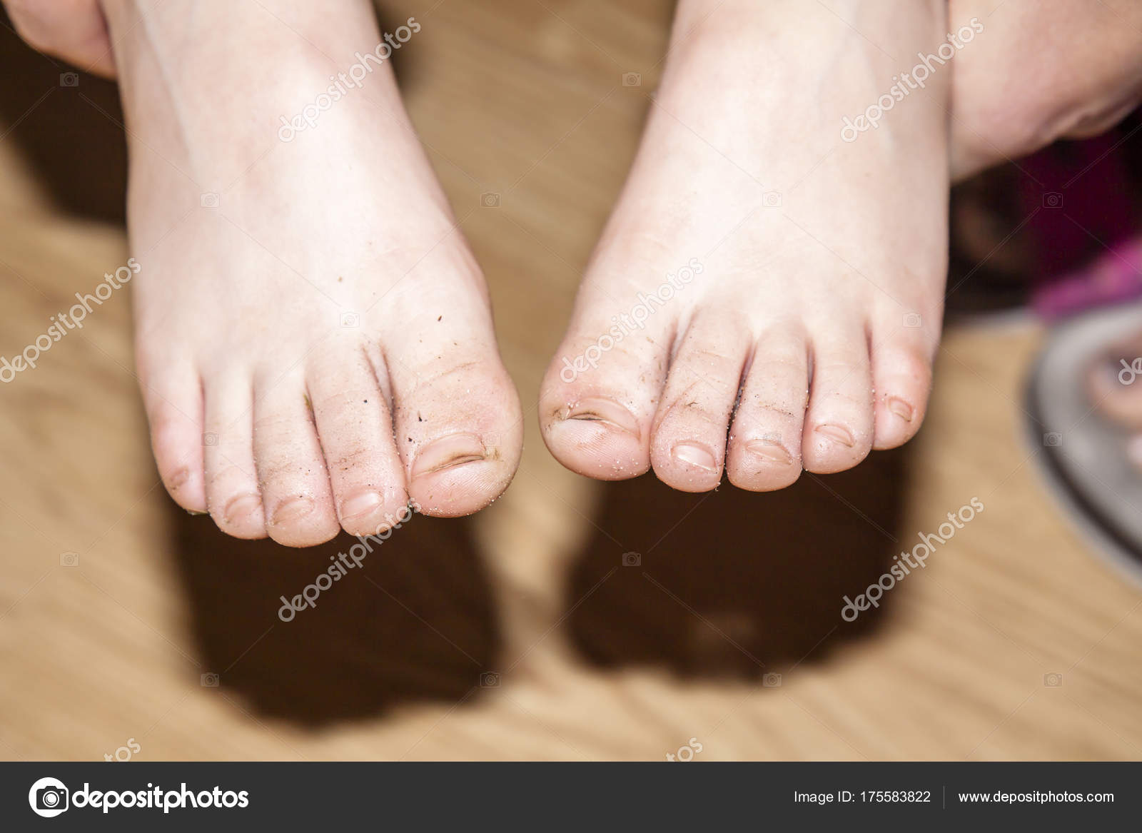A boy showing his dirty feet Stock Photo by ©Lukassek 175583822
