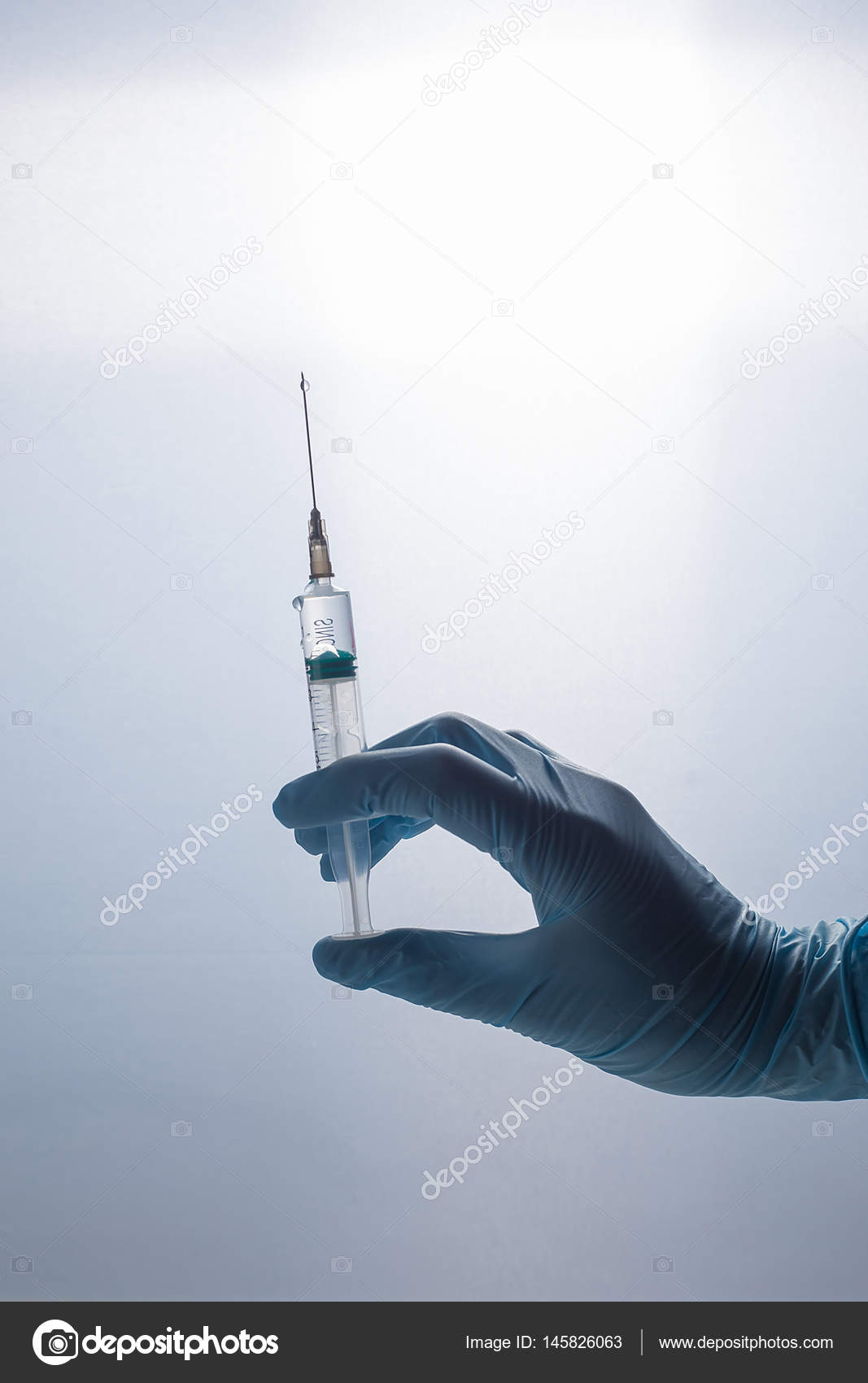 Needle in hands Stock Photo by ©photografspb 145826063