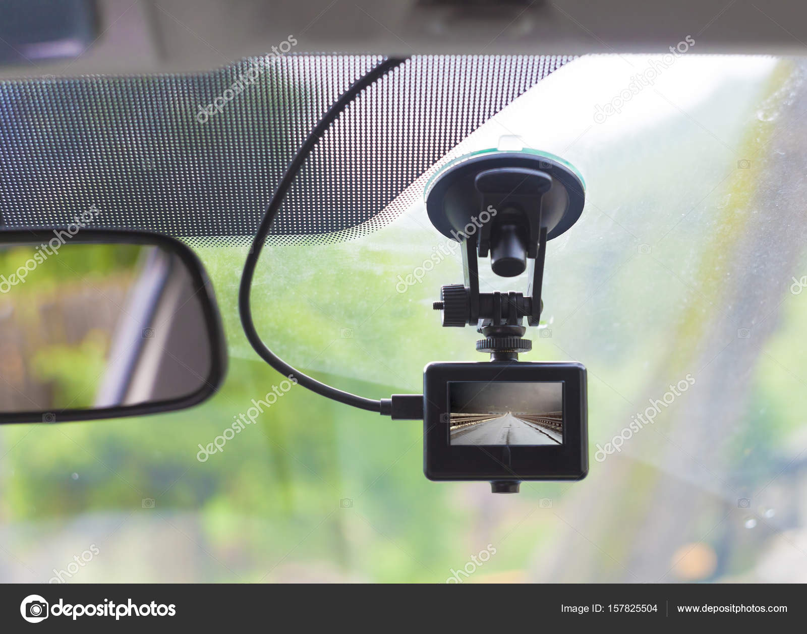 Dvr camera on car windshield Stock Photo by ©johny007pandp 157825504