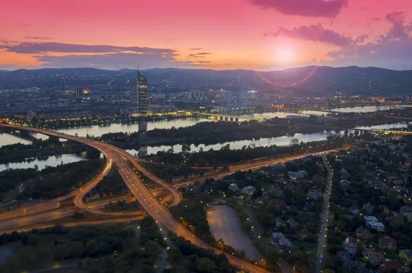Aerial panoramic view of sunset over Vienna city with skyscrapers ...