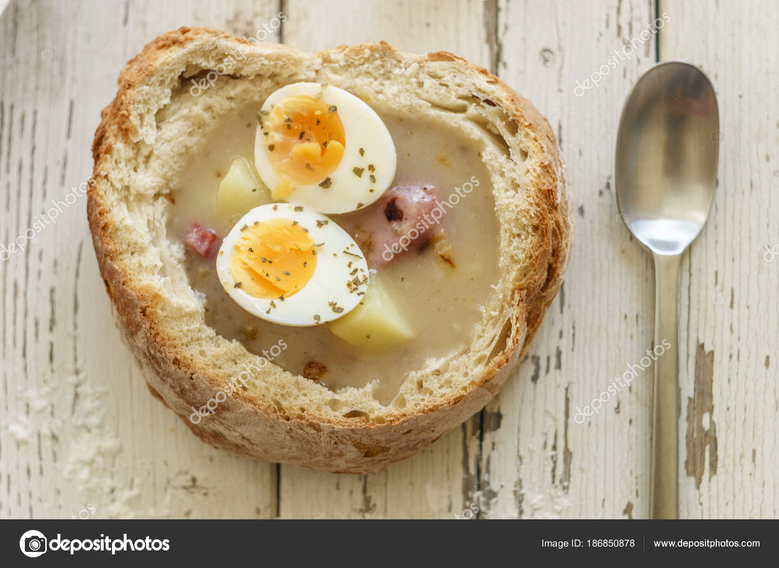 Traditional polish soup called Zurek served in small bread Stock Photo ...