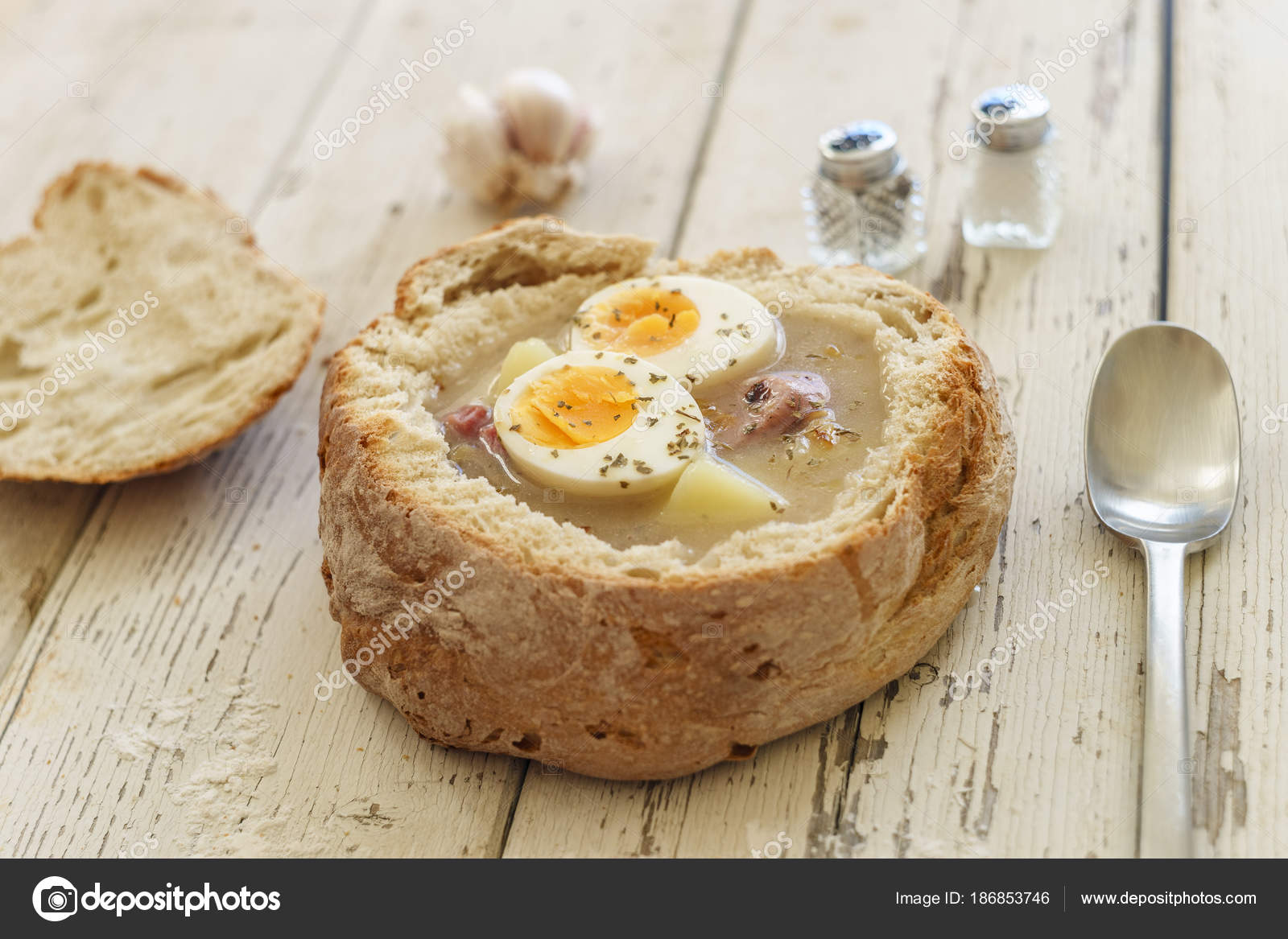 Traditional polish soup called Zurek served in small bread Stock Photo ...