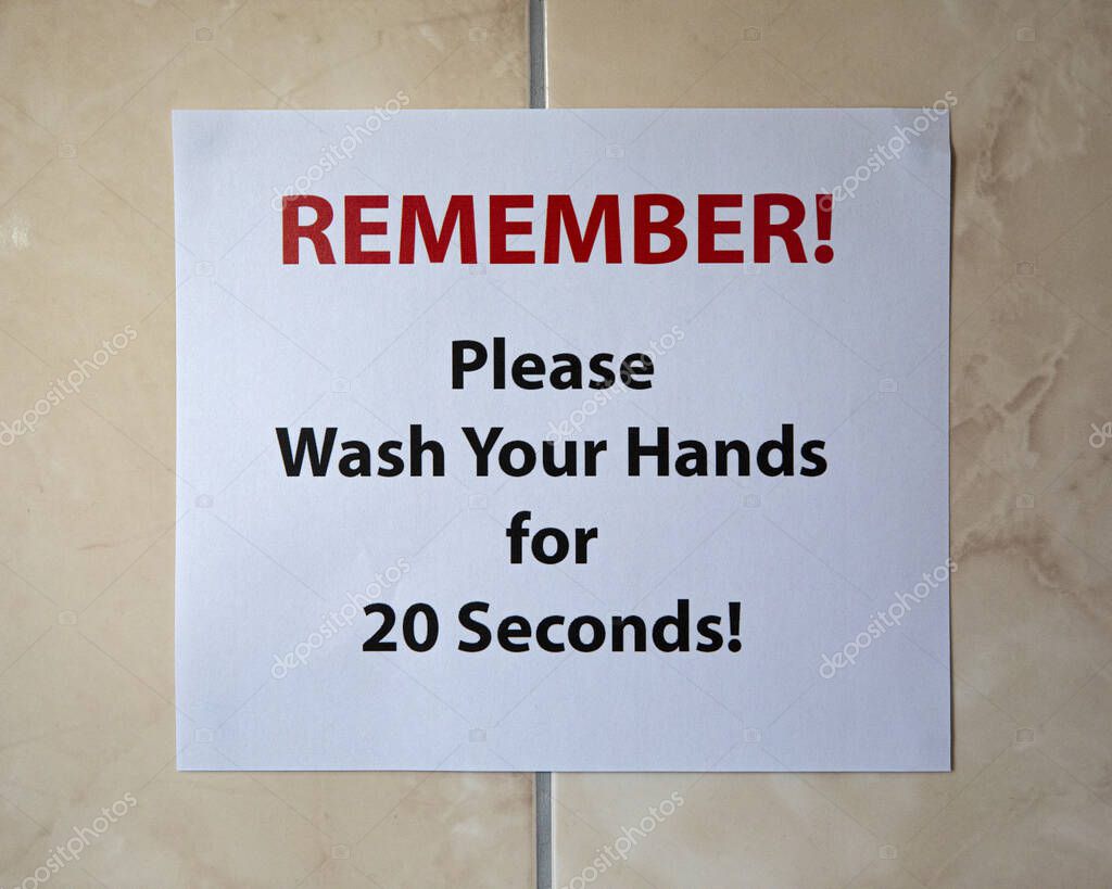 Un letrero en la pared de un baño que dice ¡RECUERDE! Por favor lávese ...