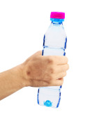 Human hand holding a bottle of water — Stock Photo © nejron #1741161
