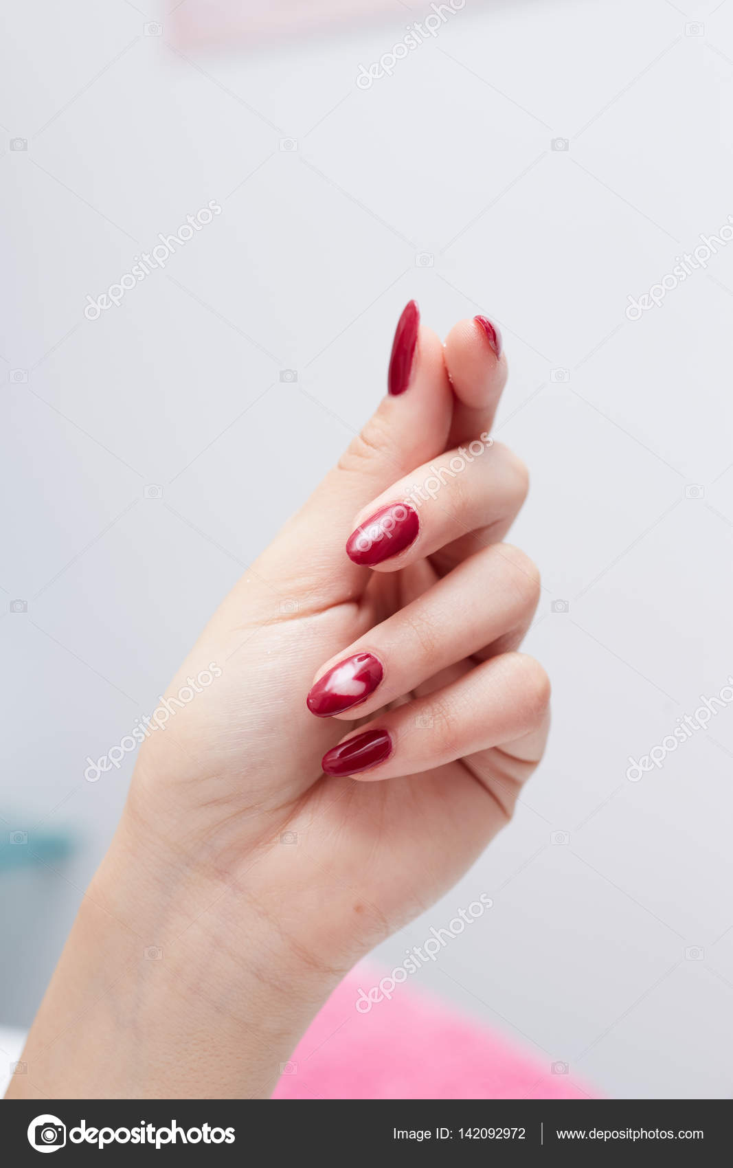 Woman's hand with polish nails Stock Photo by ©ferrerivideo 142092972