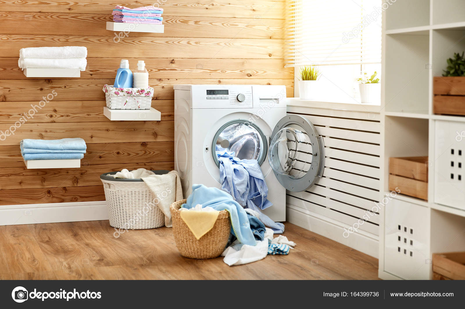 Interior of real laundry room with washing machine at window at — Stock ...