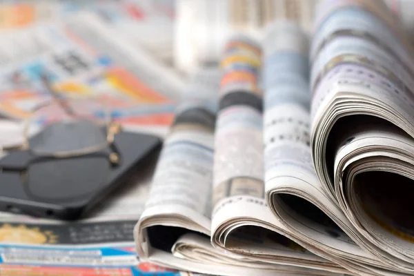 News morning Newspapers on the desktop in the office, the concept of ...