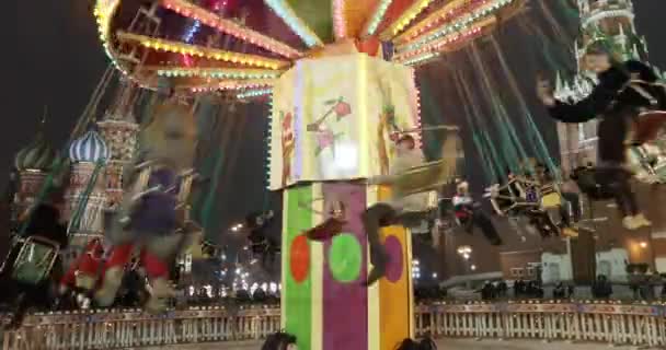 Chain carousel with passengers — Stock Video © SpstudioVideo #332654930