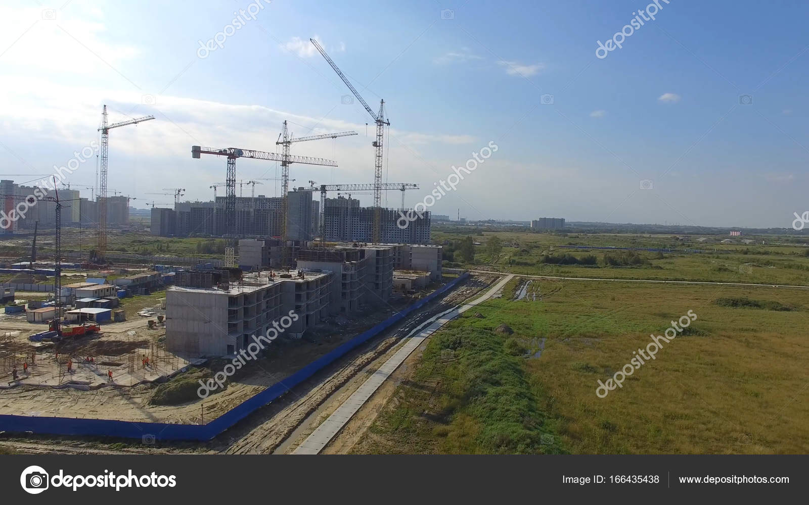 Aerial view on construction building. Construction site workers, aerial ...