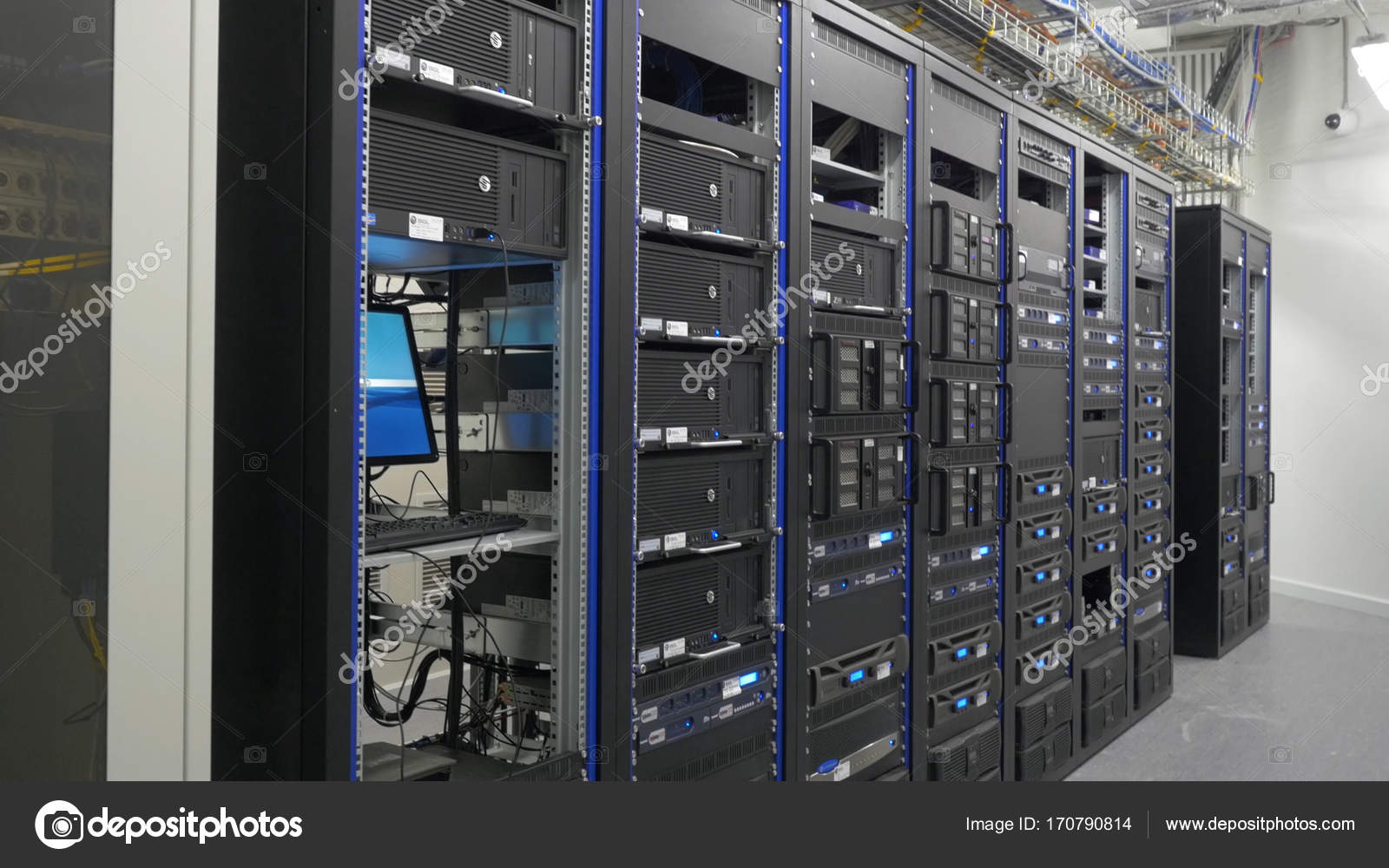 Many powerful servers running in the data center server room. Many ...