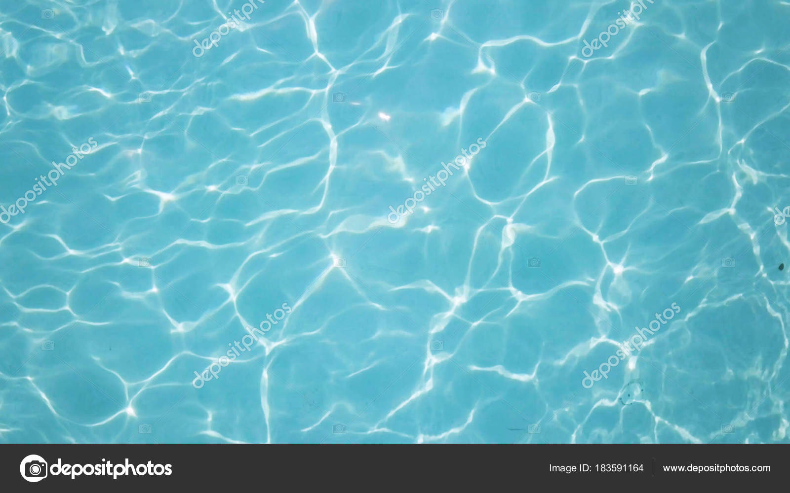 Water in swimming pool rippled water detail background. Water in ...