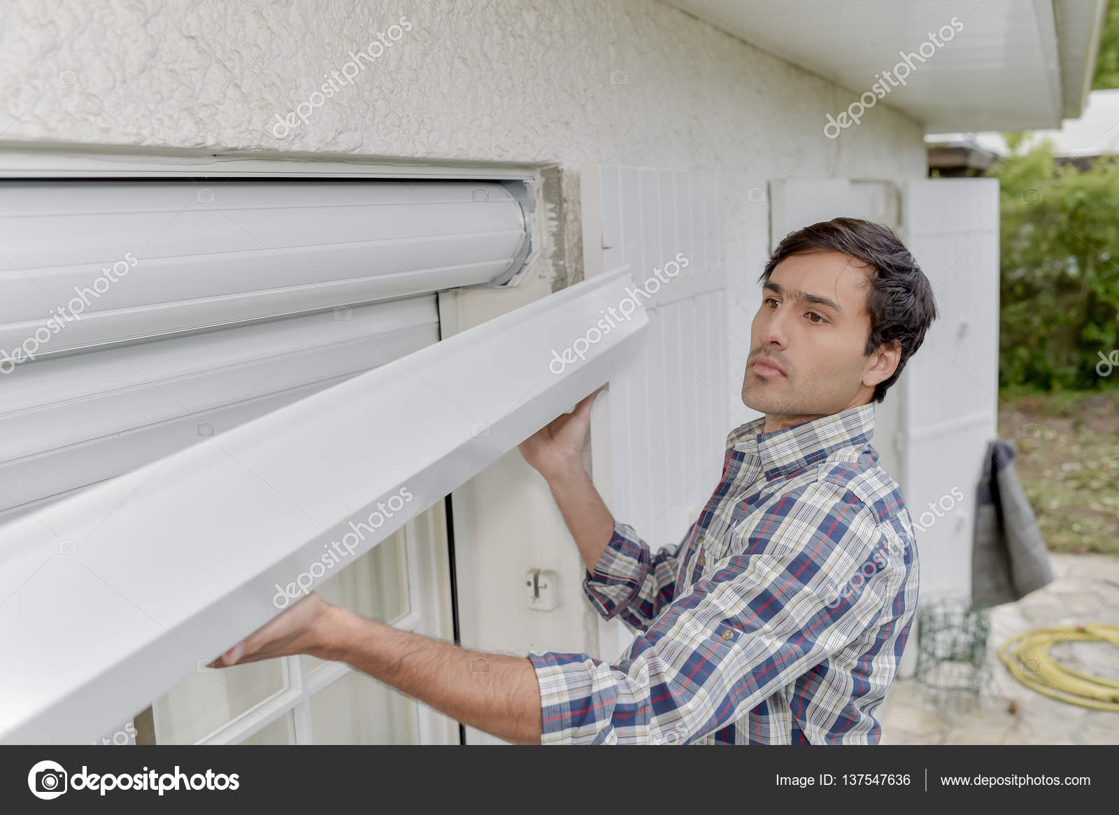Installing window shutter and architecture — Stock Photo ...