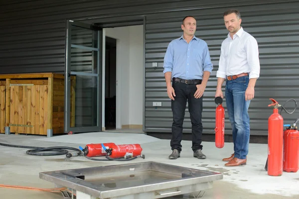 Fire extinguisher safety training — Stock Photo © photography33 #130800182