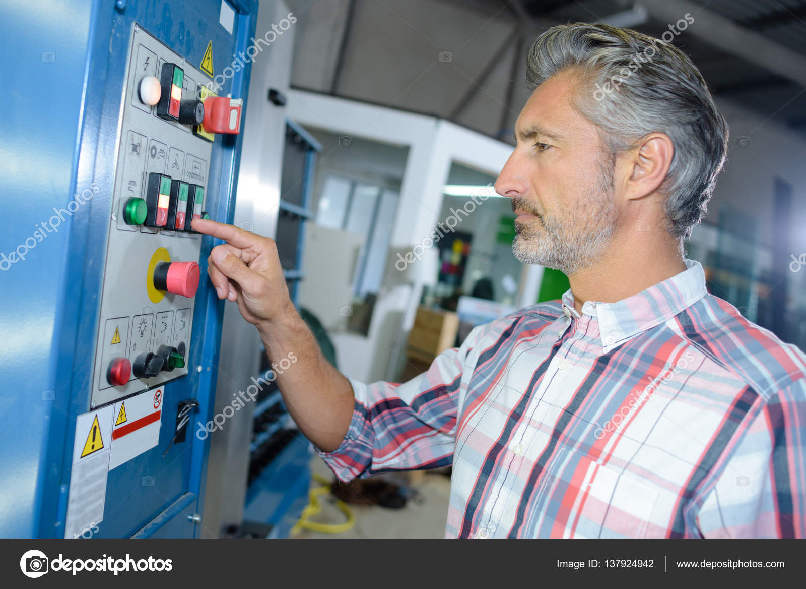 Man operating factory machine — Stock Photo © photography33 #137924942