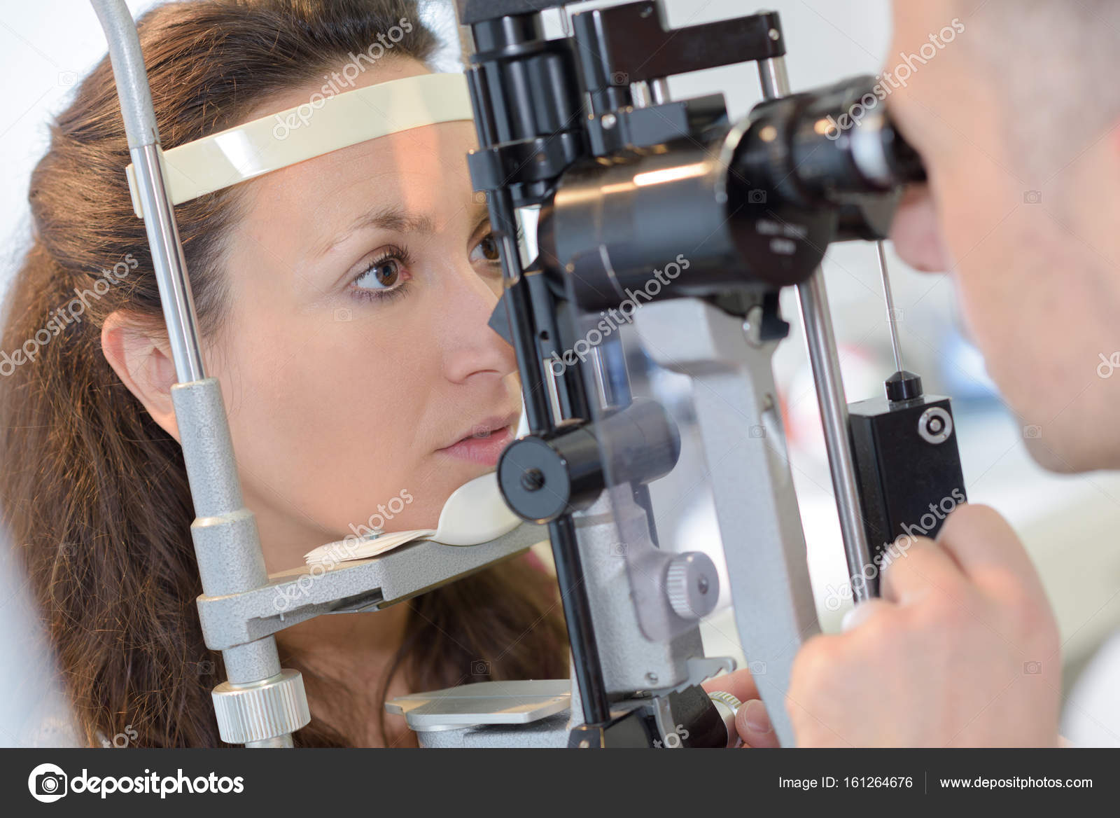 Woman having eye test Stock Photo by ©photography33 161264676