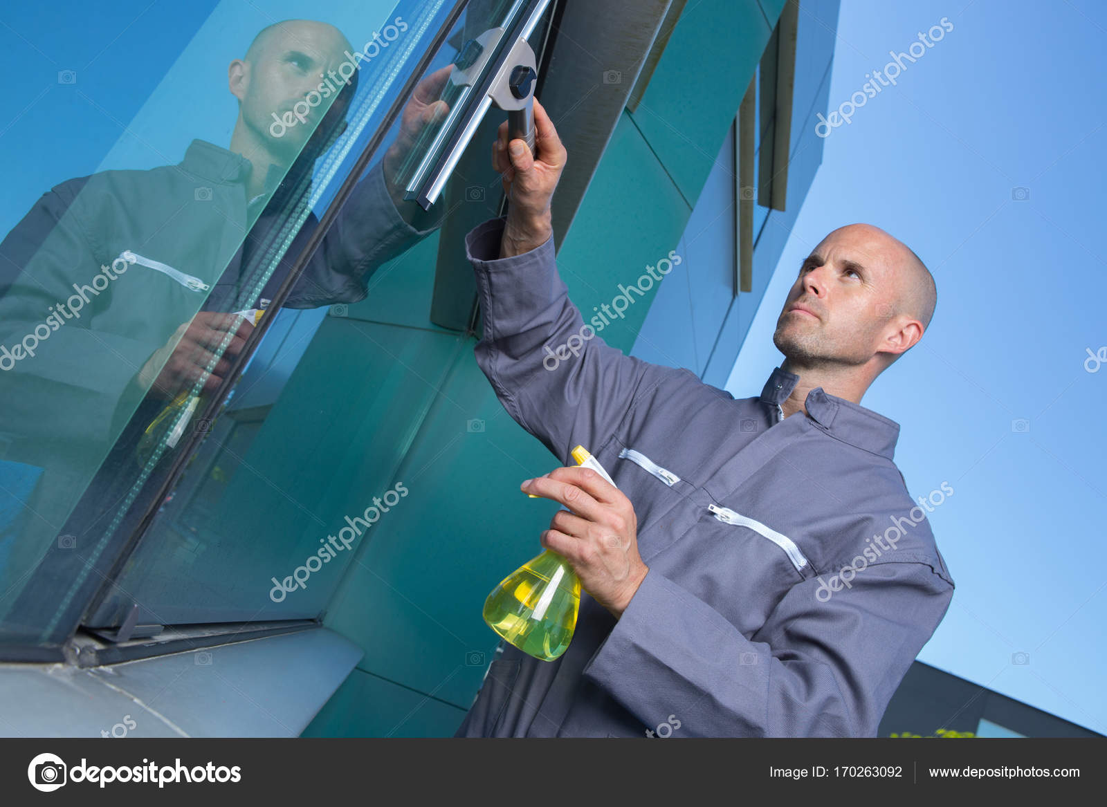 Man cleaning window and man Stock Photo by ©photography33 170263092