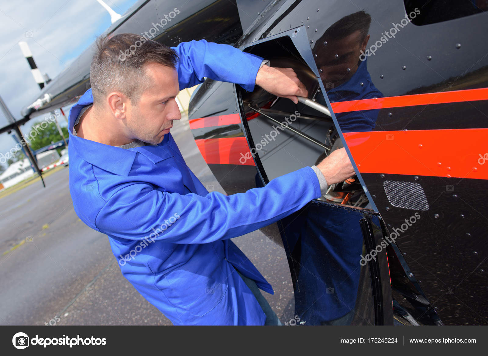 Fixing the helicopter and mechanic Stock Photo by ©photography33 175245224