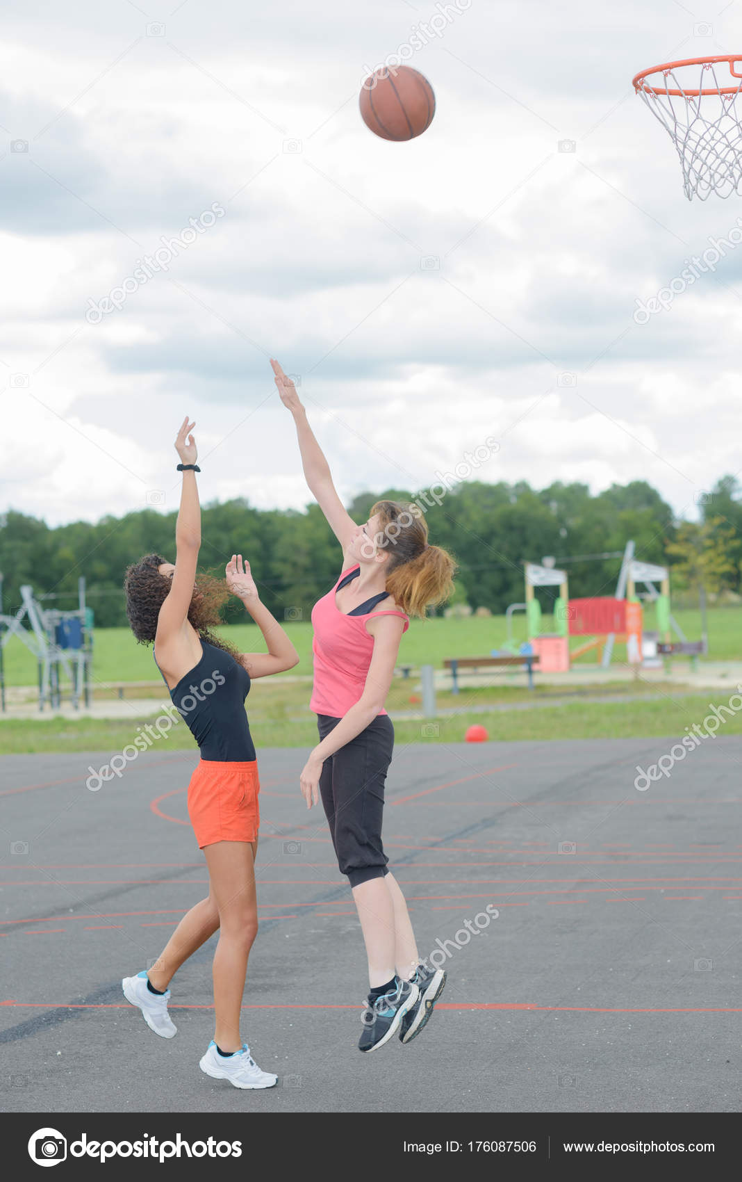 Players practising netball in playground — Stock Photo © photography33 ...
