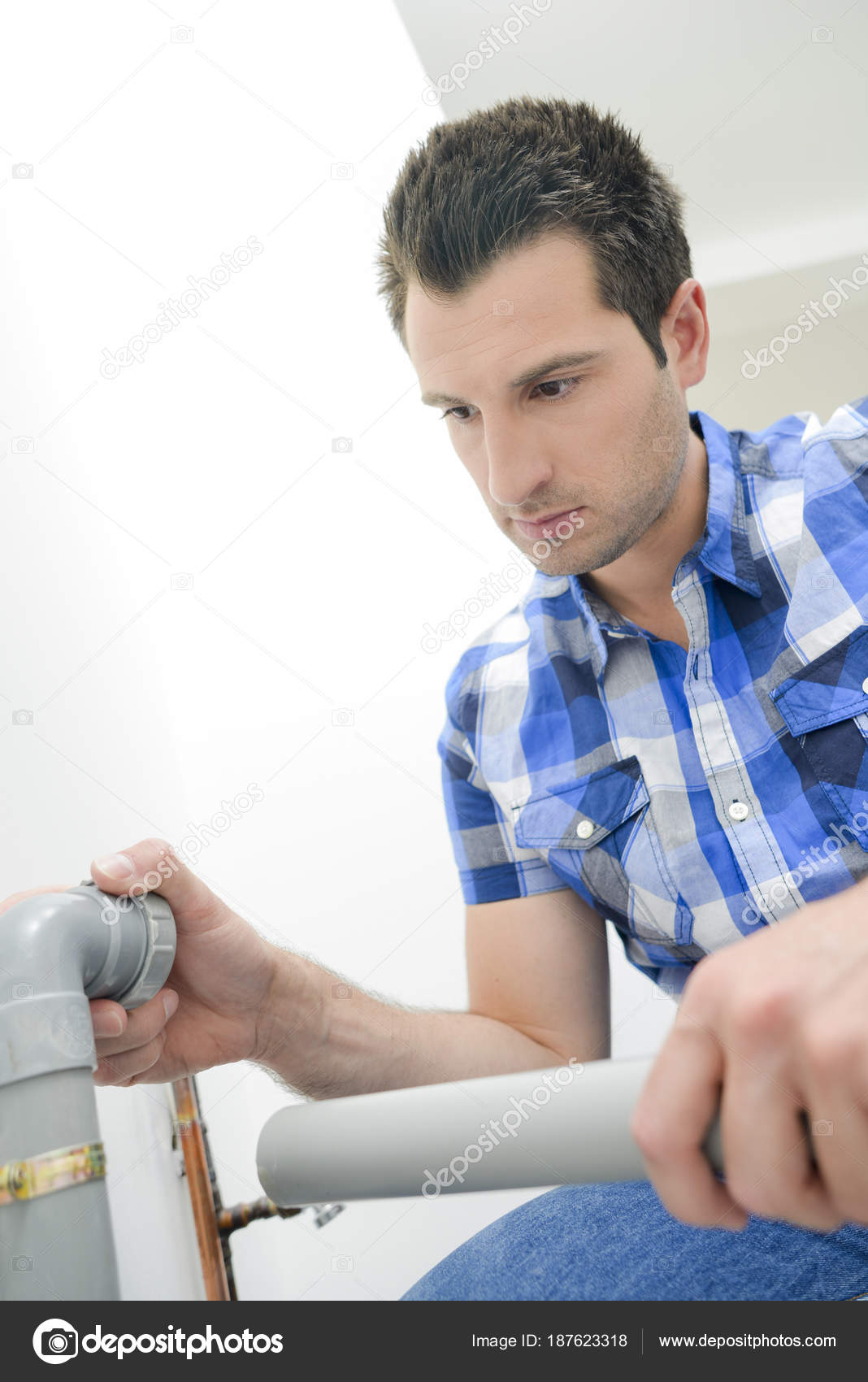 Plumber fixing a pipe — Stock Photo © photography33 #187623318