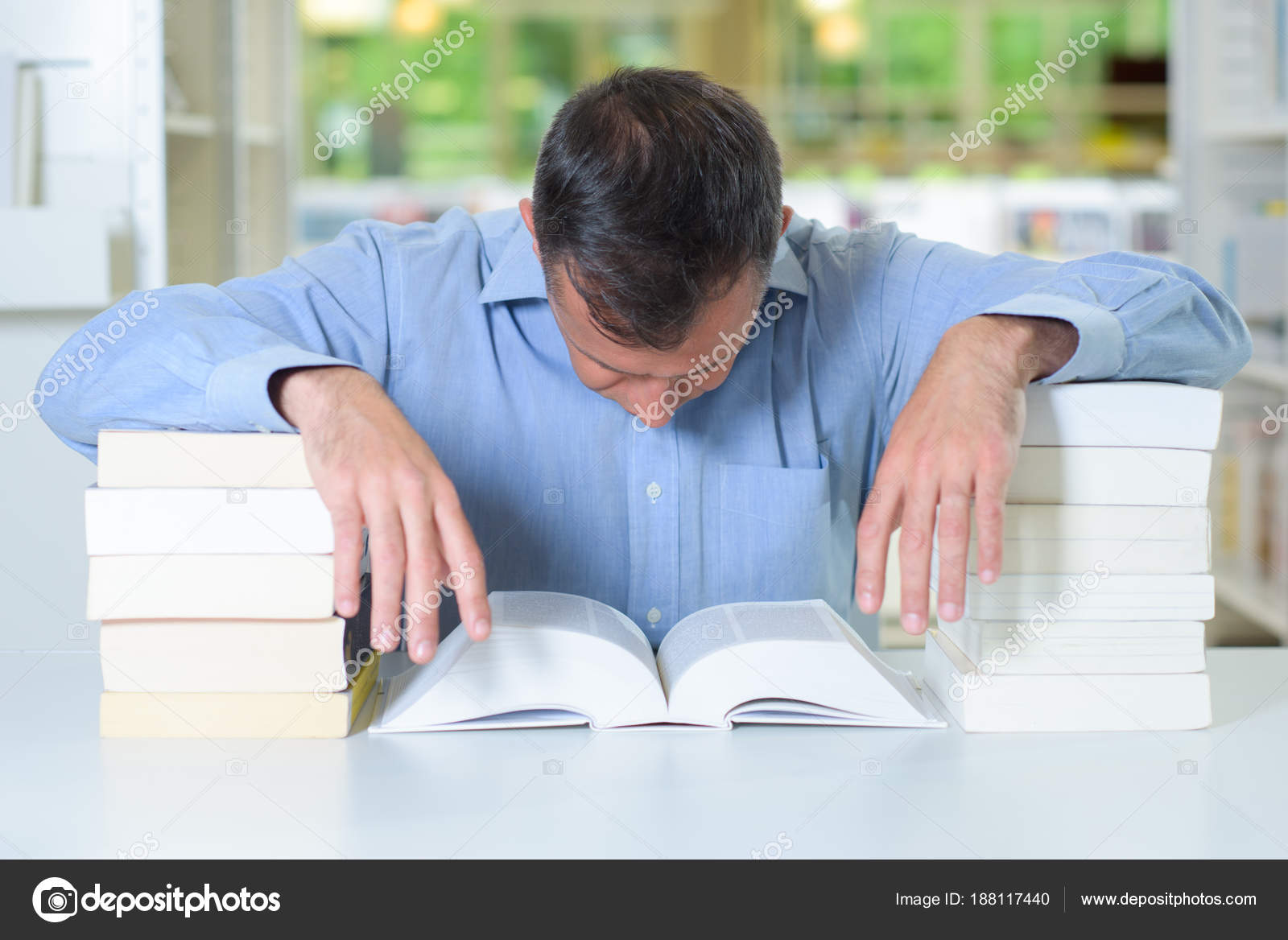Using books for support Stock Photo by ©photography33 188117440