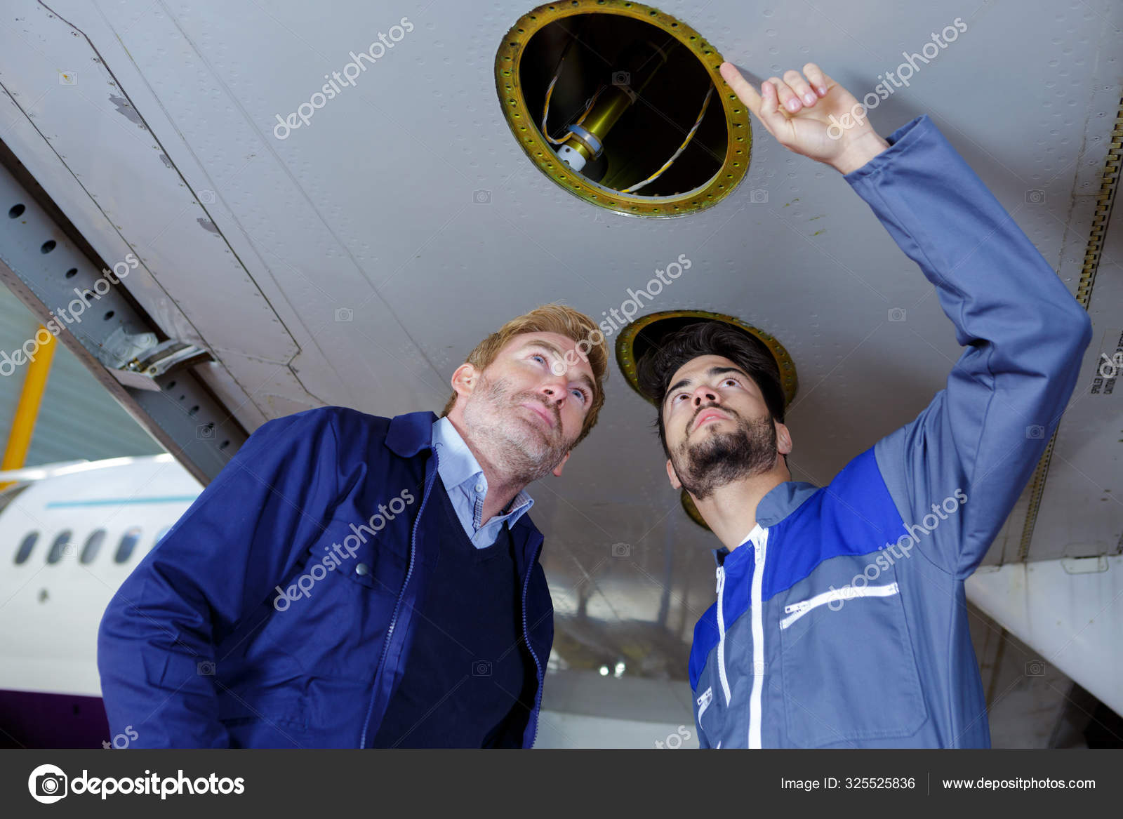 Male aero engineer working in helicopter cockpit — Stock Photo ...